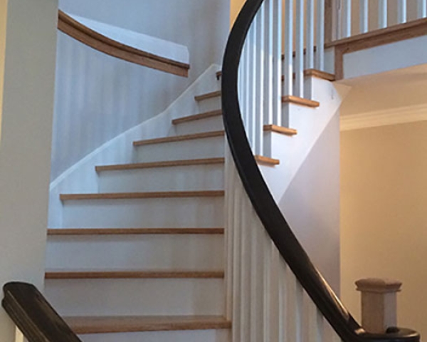 Circular stairs-metal spindles-reveneering stringers installation